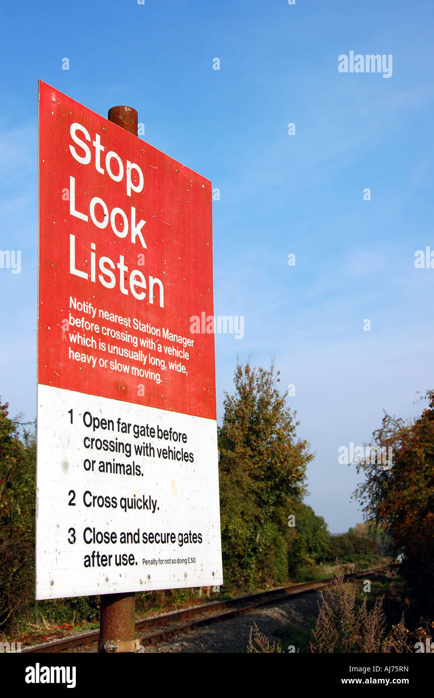 Sign at unmanned rail crossing, Bucks, UK Stock Photo - Alamy