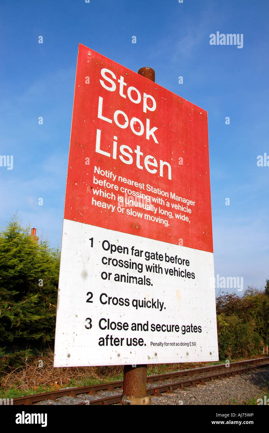 Sign at unmanned rail crossing, Bucks, UK Stock Photo - Alamy