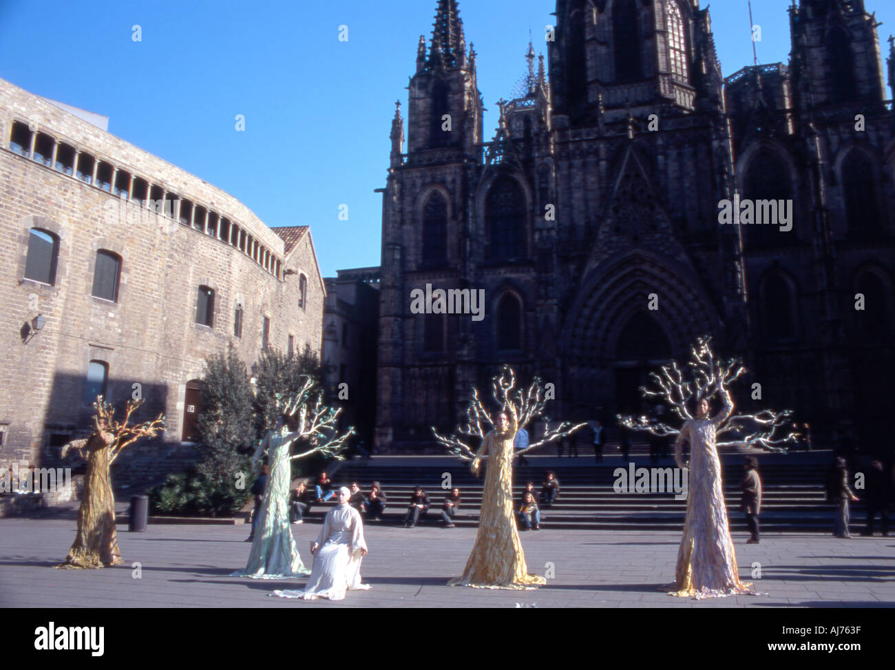 group of buskers dressed as trees in front of the gothic cathedral barcelona Stock Photo - Alamy
