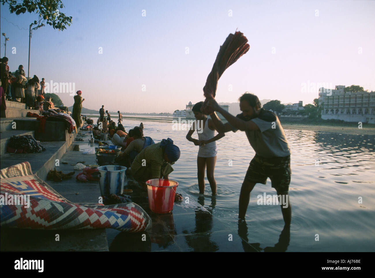 Man washing up clothes Udaipur Rajasthan India Stock Photo - Alamy