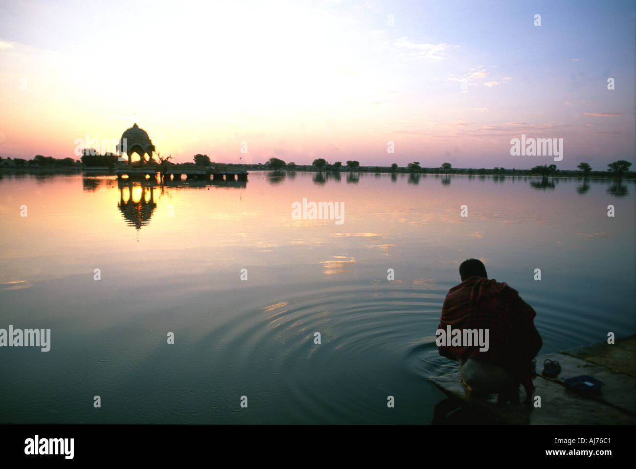 Morning light Jaisalmer India sunrise ritual ablutions Stock Photo - Alamy