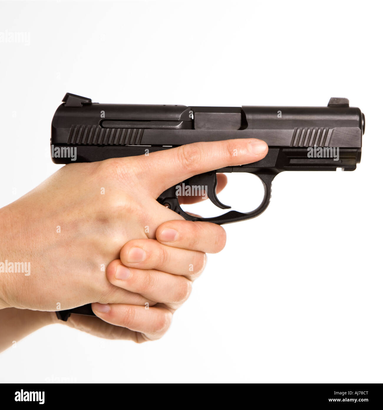 Close up of mid adult female Caucasian law enforcement officer hands on ...