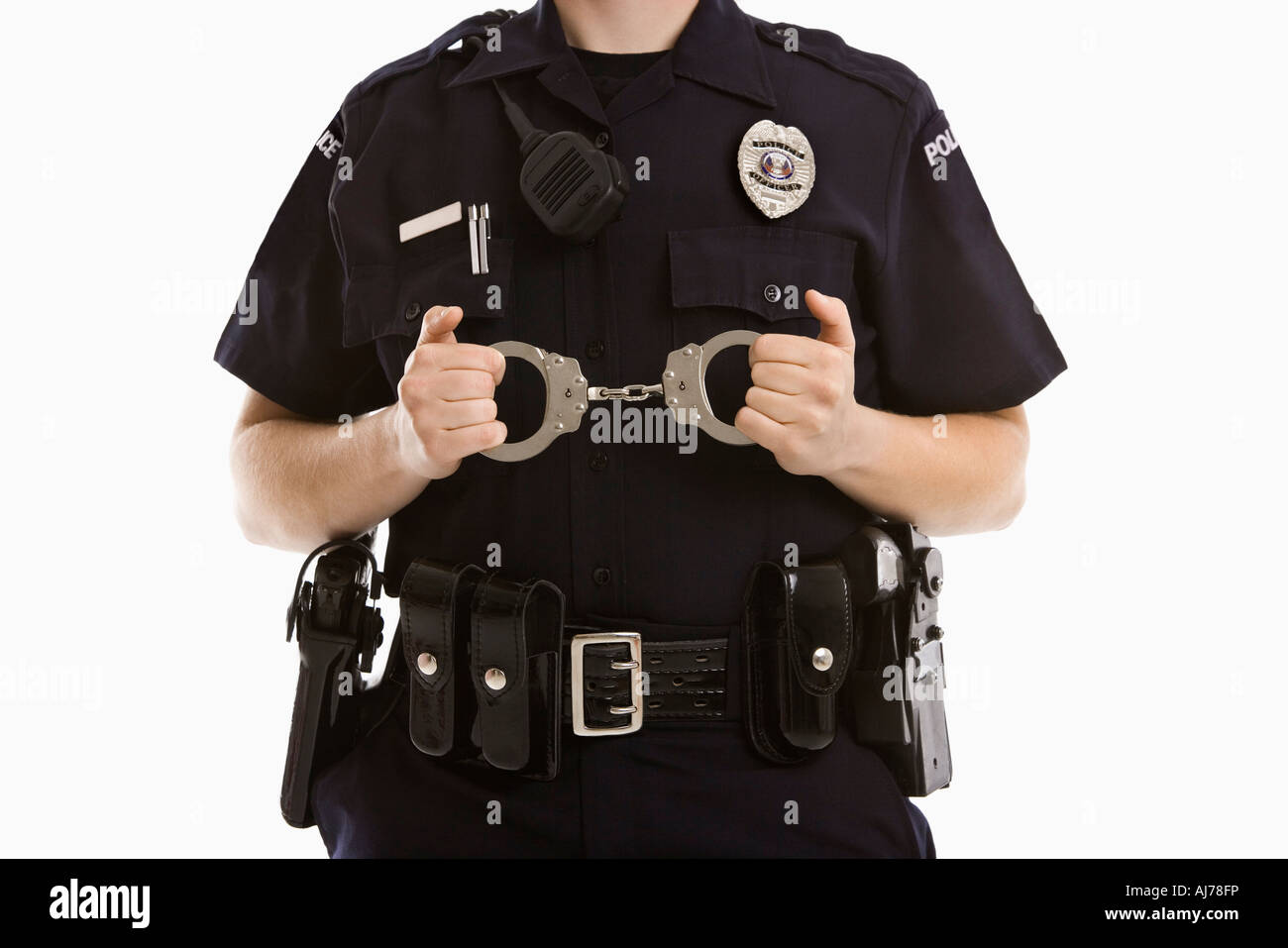 Police woman and holding police badge hi-res stock photography and ...