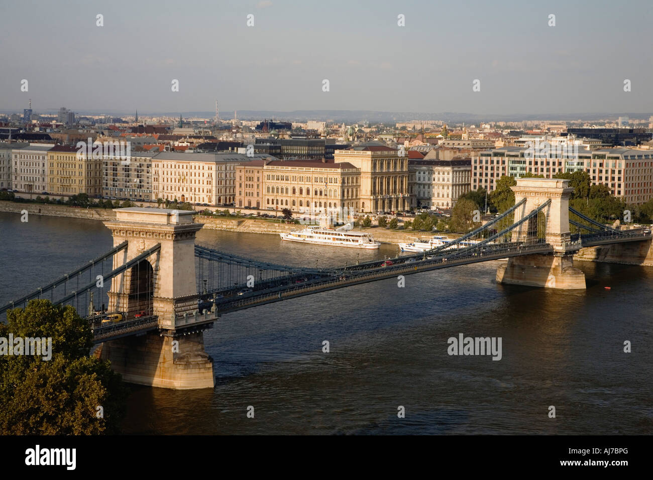 Chain Bridge crosses the Danube River which connects Buda with Pest ...