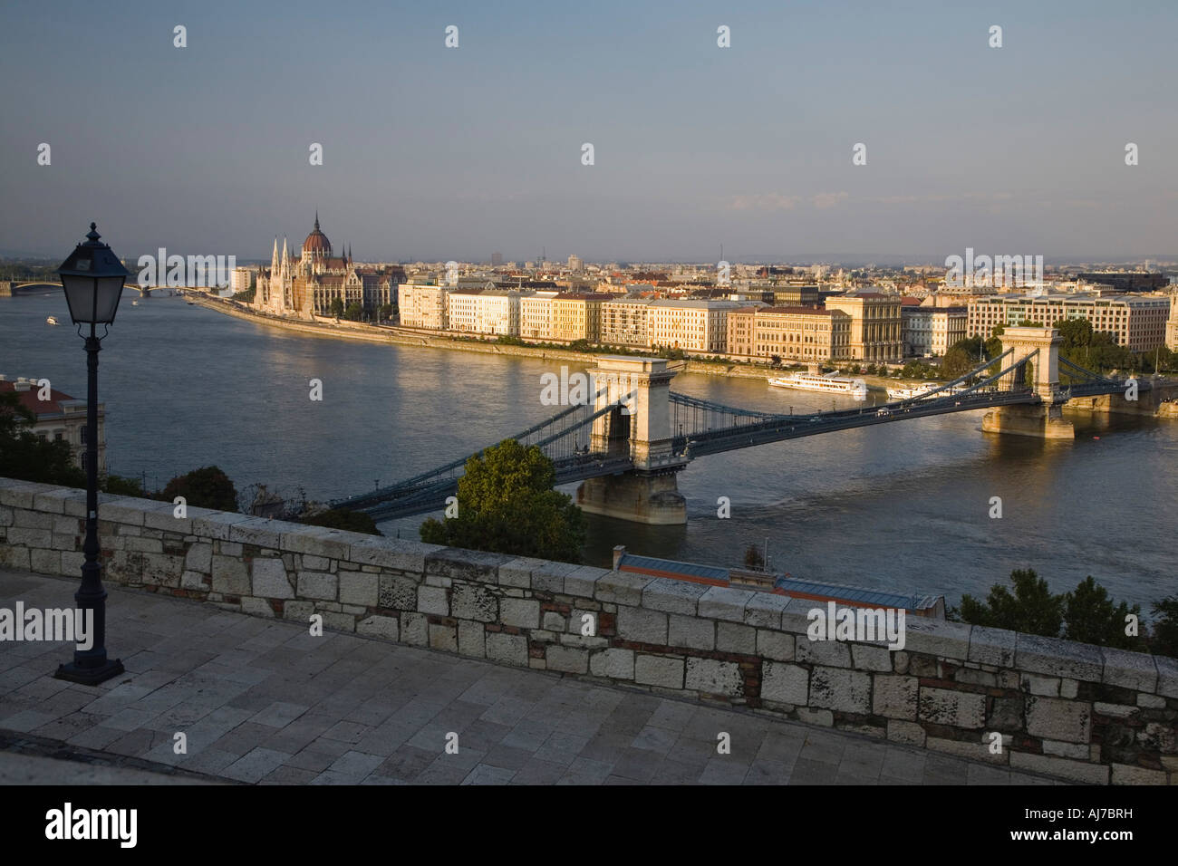 Early light on the buildings of Pest, Chain Bridge crosses the Danube ...