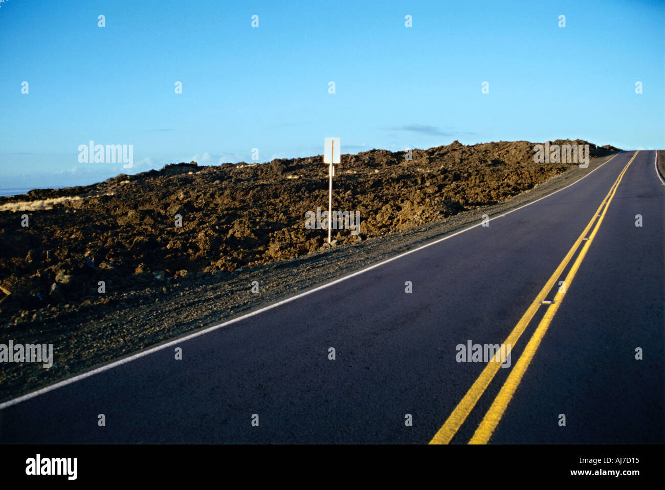 Two lane road with view of valley and blue sky Stock Photo - Alamy