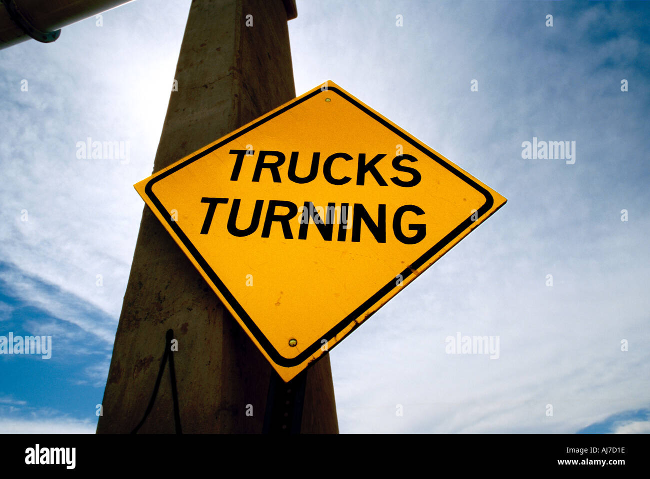 Trucks Turning sign Stock Photo - Alamy