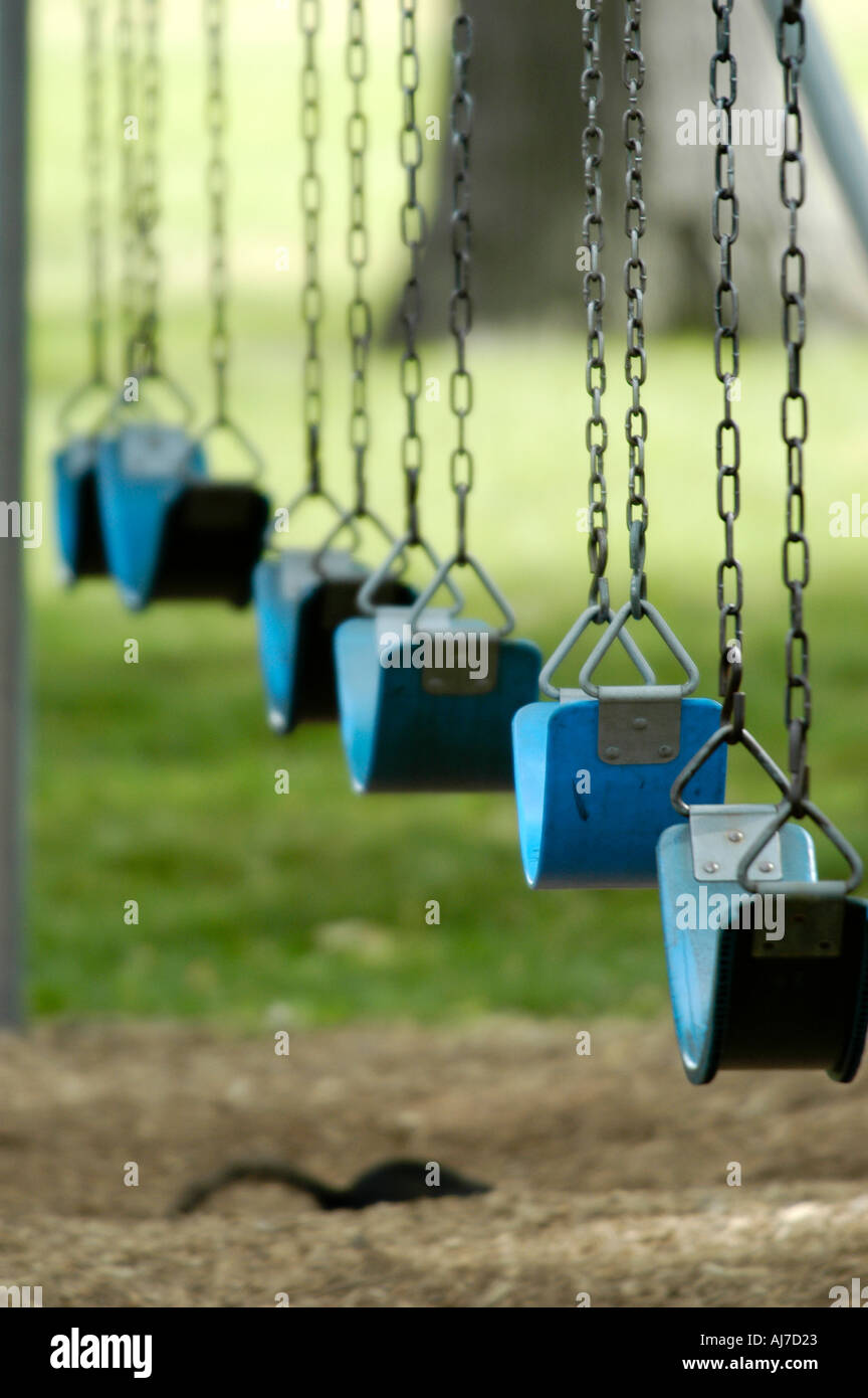 Pattern of Blue Swings Hang From Chains Stock Photo - Alamy