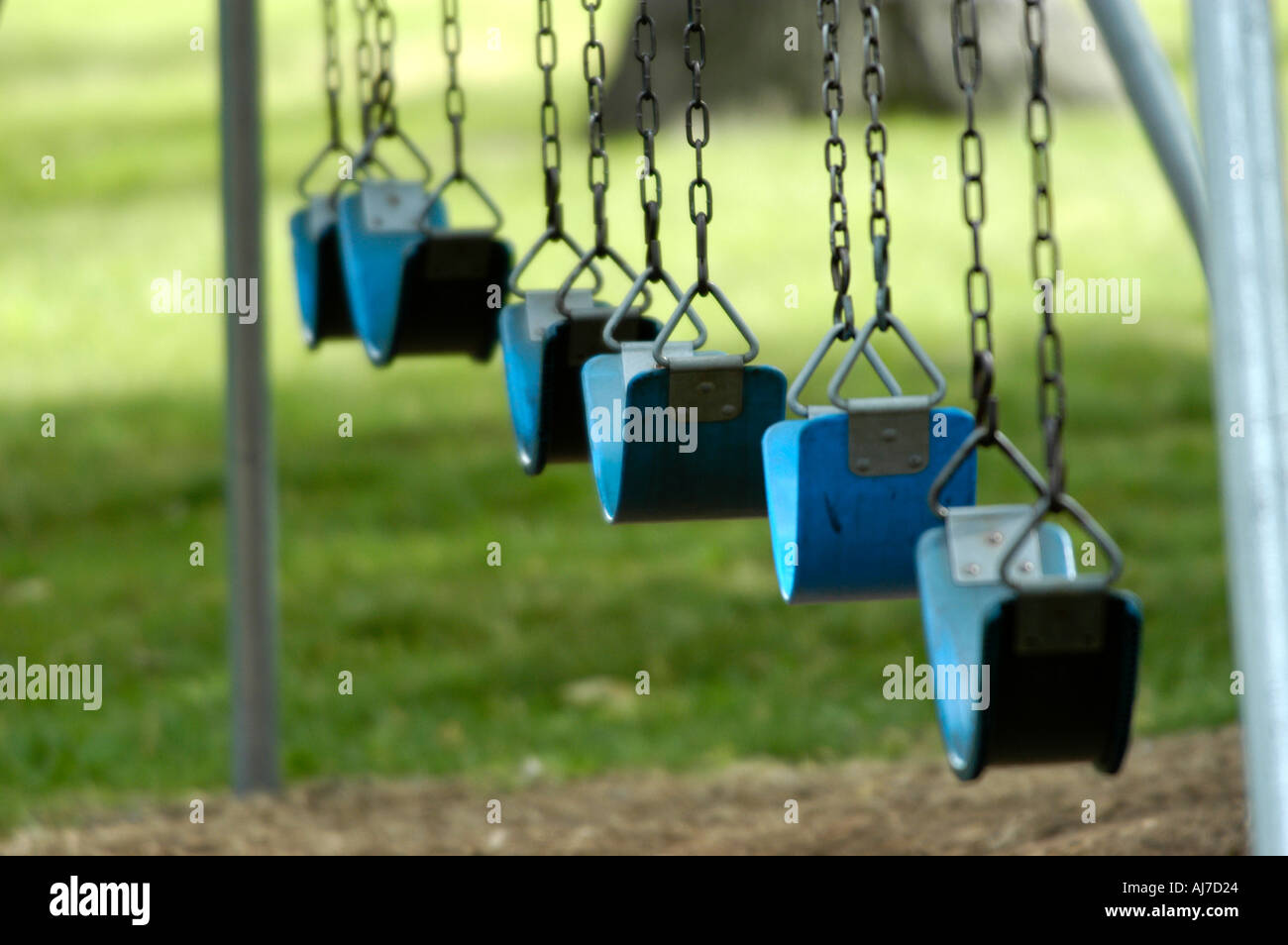 Pattern of Blue Swings Hang From Chains Stock Photo - Alamy