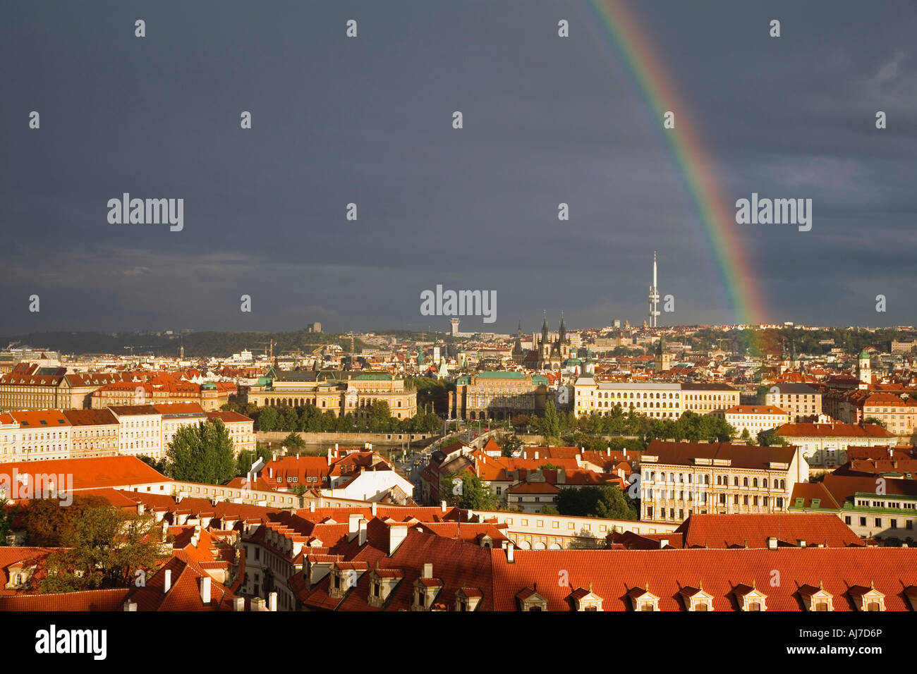 Late summer thunderstorm passes through with rainbow falling on the ...