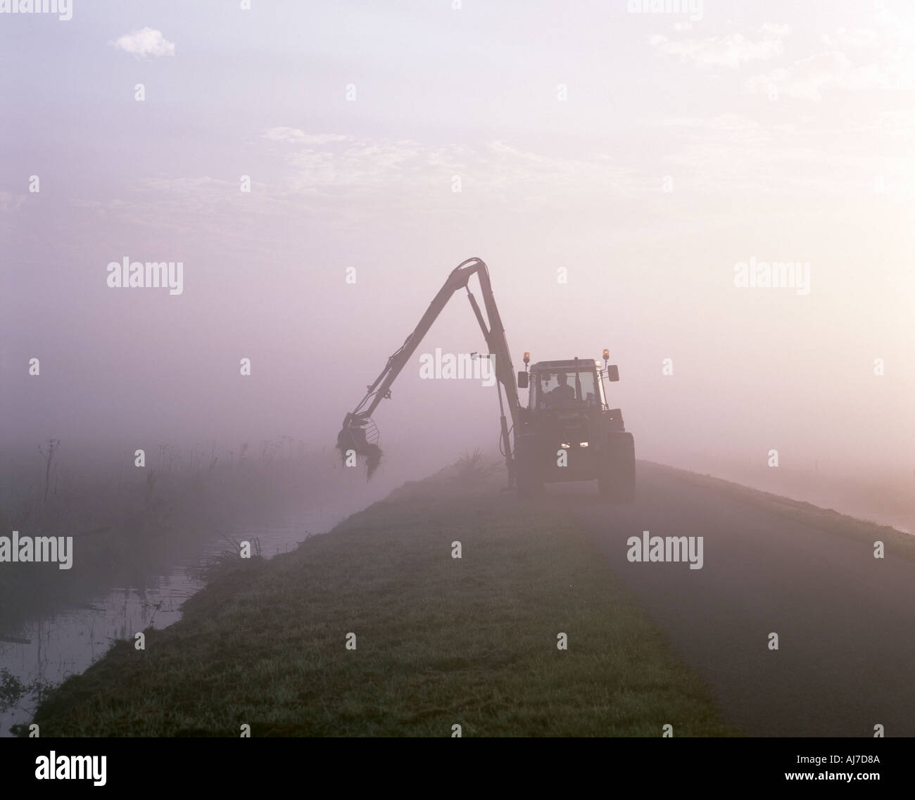 Cleaning a ditch Stock Photo - Alamy