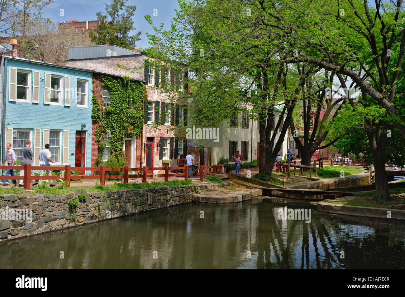Brick building line the waterway in the Chesapeake and Ohio Canal ...