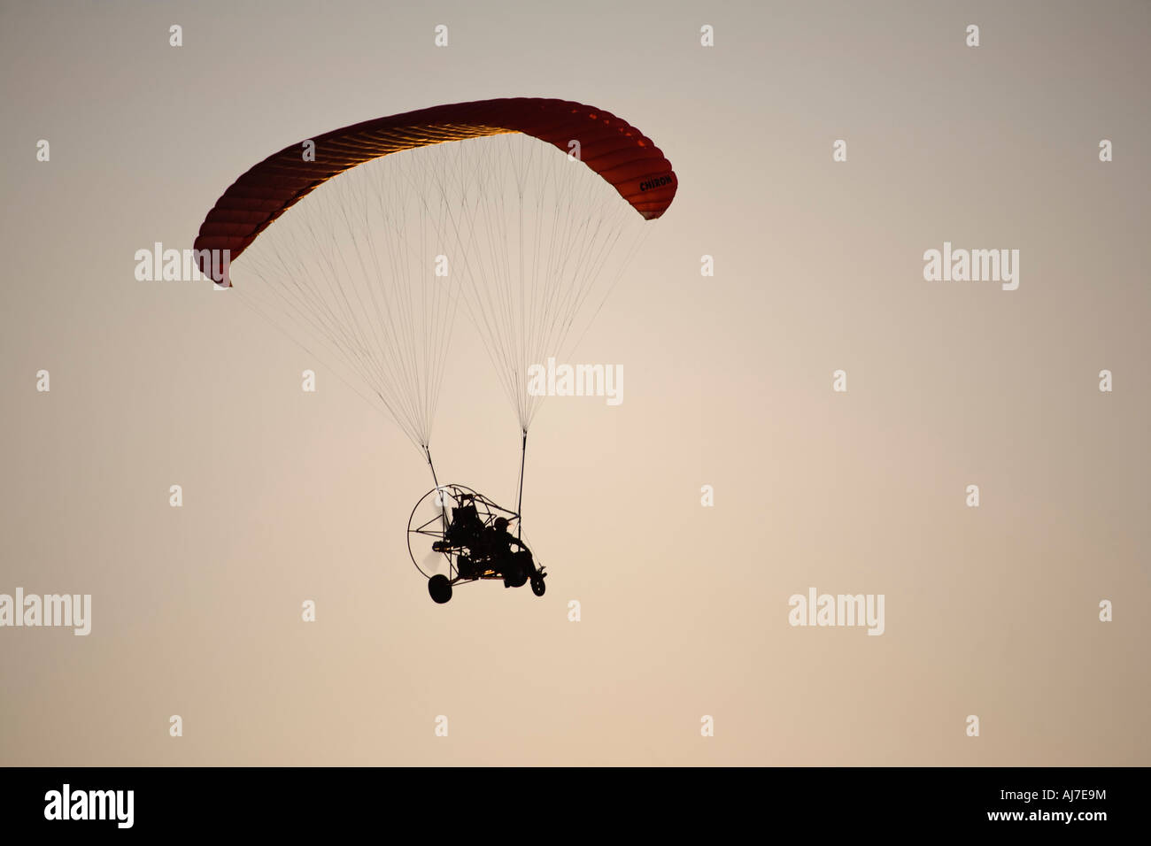 Power propelled glider at sunset Stock Photo - Alamy