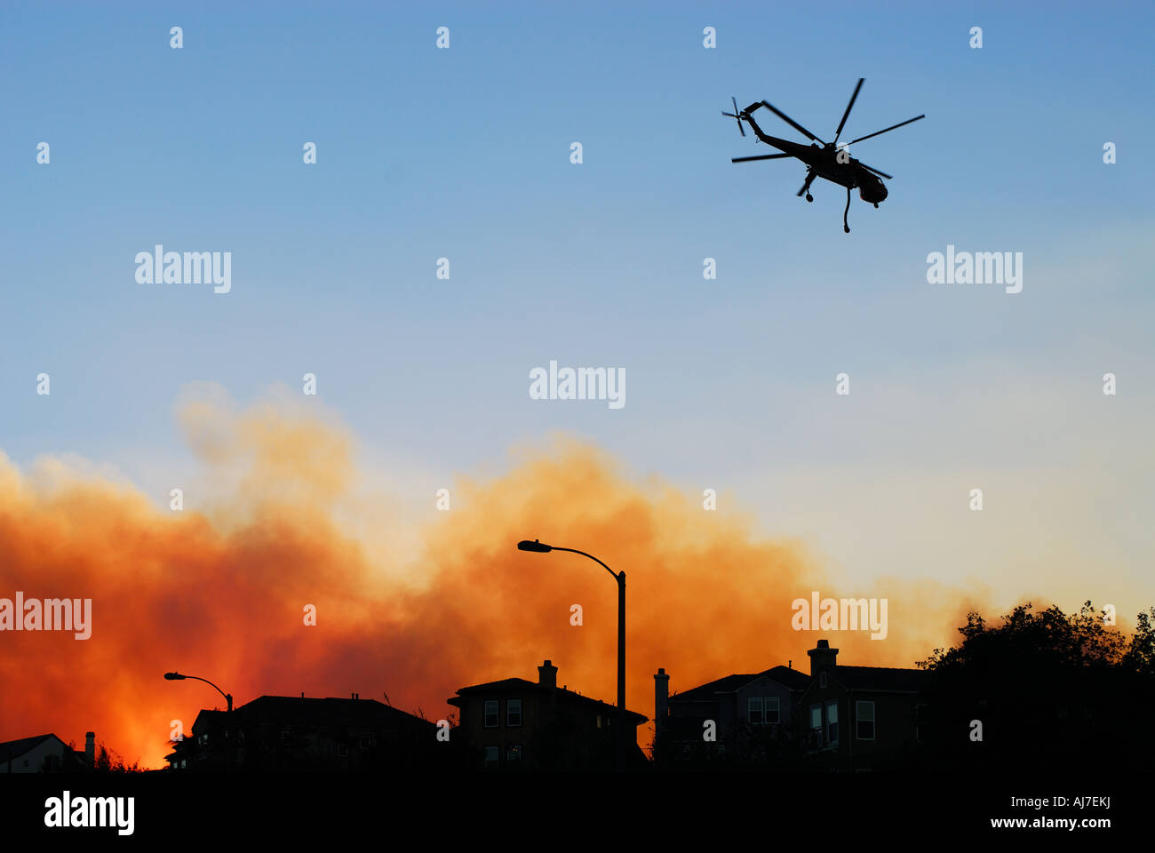 Sikorsky Helicopter Preparing to Drop Water On A Wildfire Fire over ...