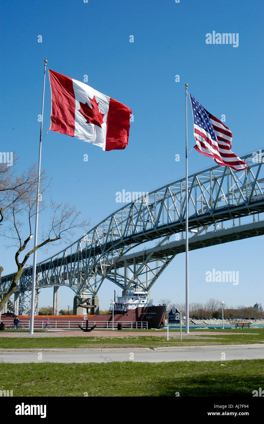 Canadian and American Flags Fly Side by Side Stock Photo - Alamy