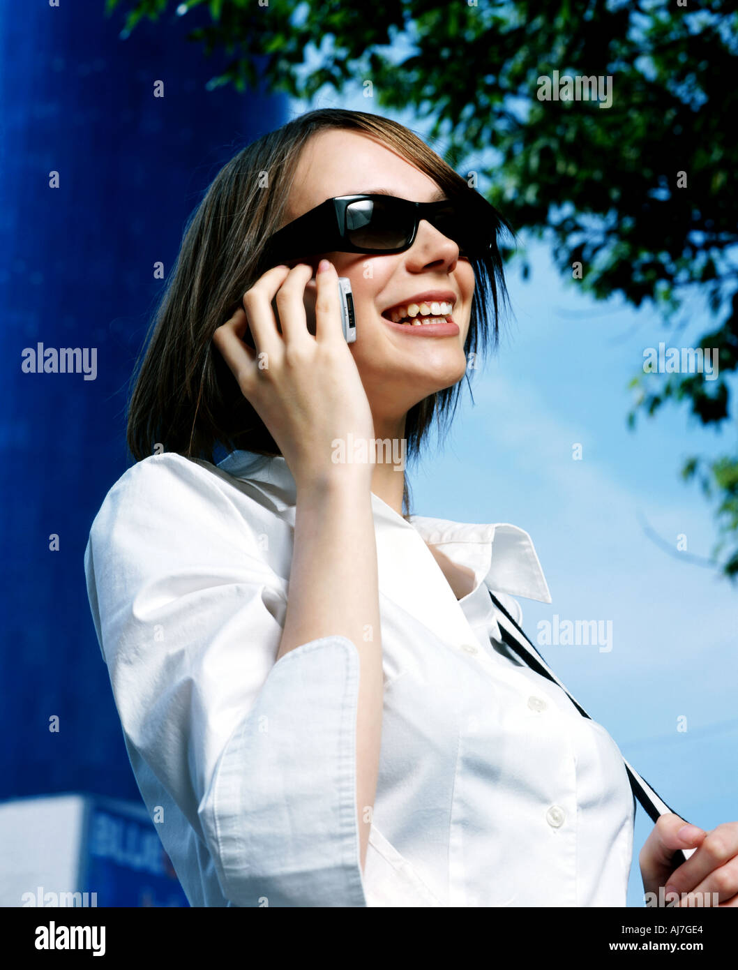 outdoor city street summer day fragment building tree woman young girl ...
