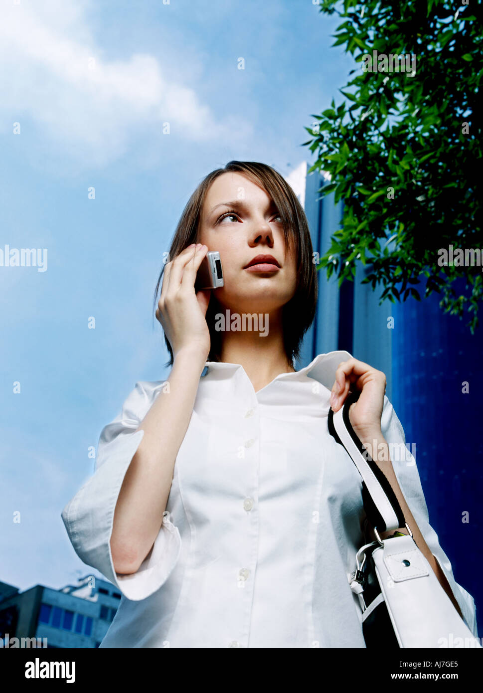 outdoor city street summer day fragment building tree woman young girl ...