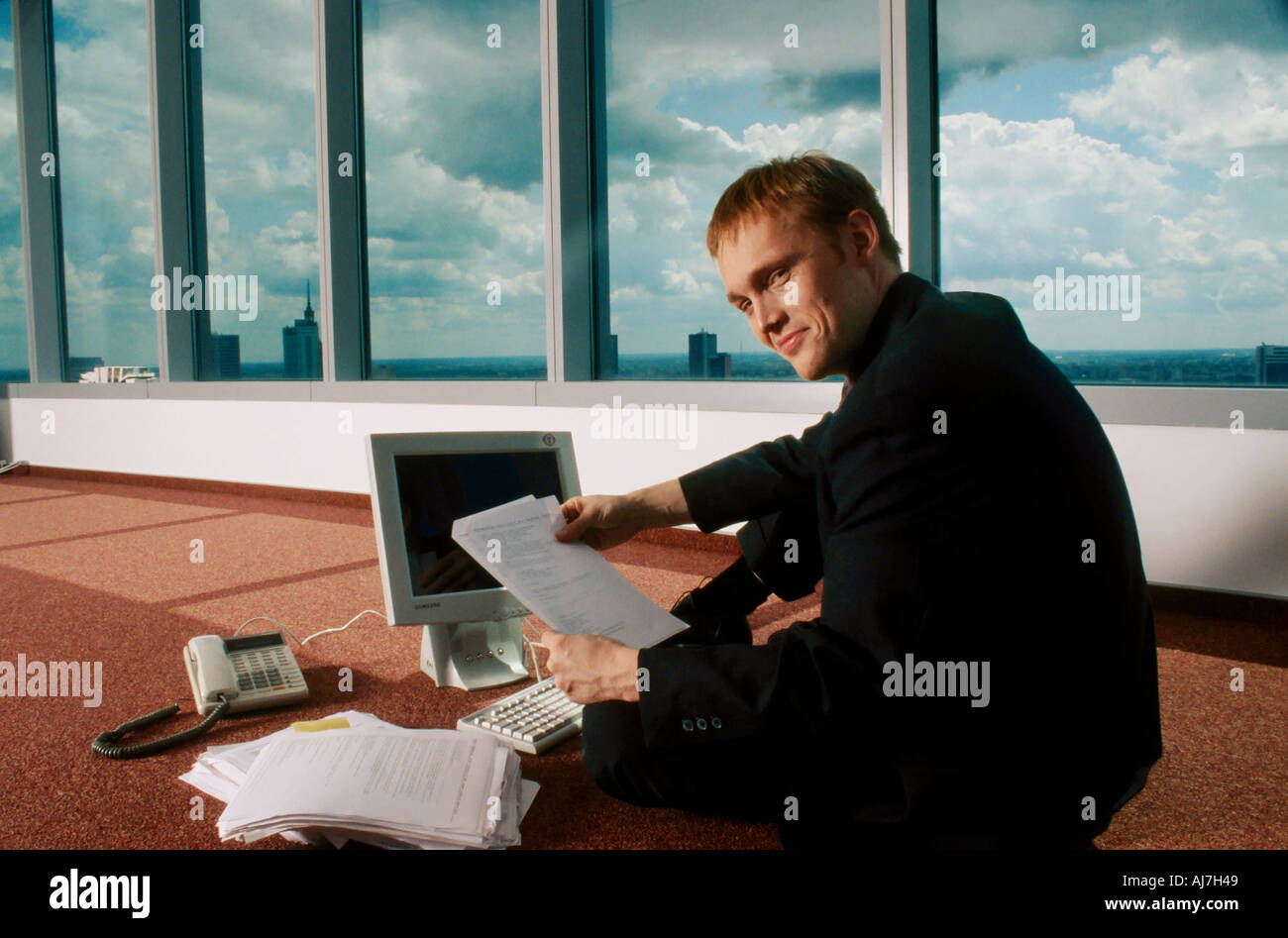 indoor office man 25 30 young blonde smile smiling window windows day ...