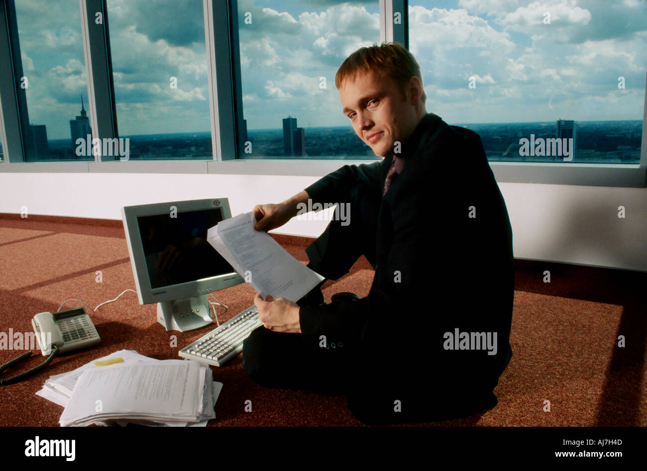indoor office man 25 30 young blonde smile smiling window windows day ...