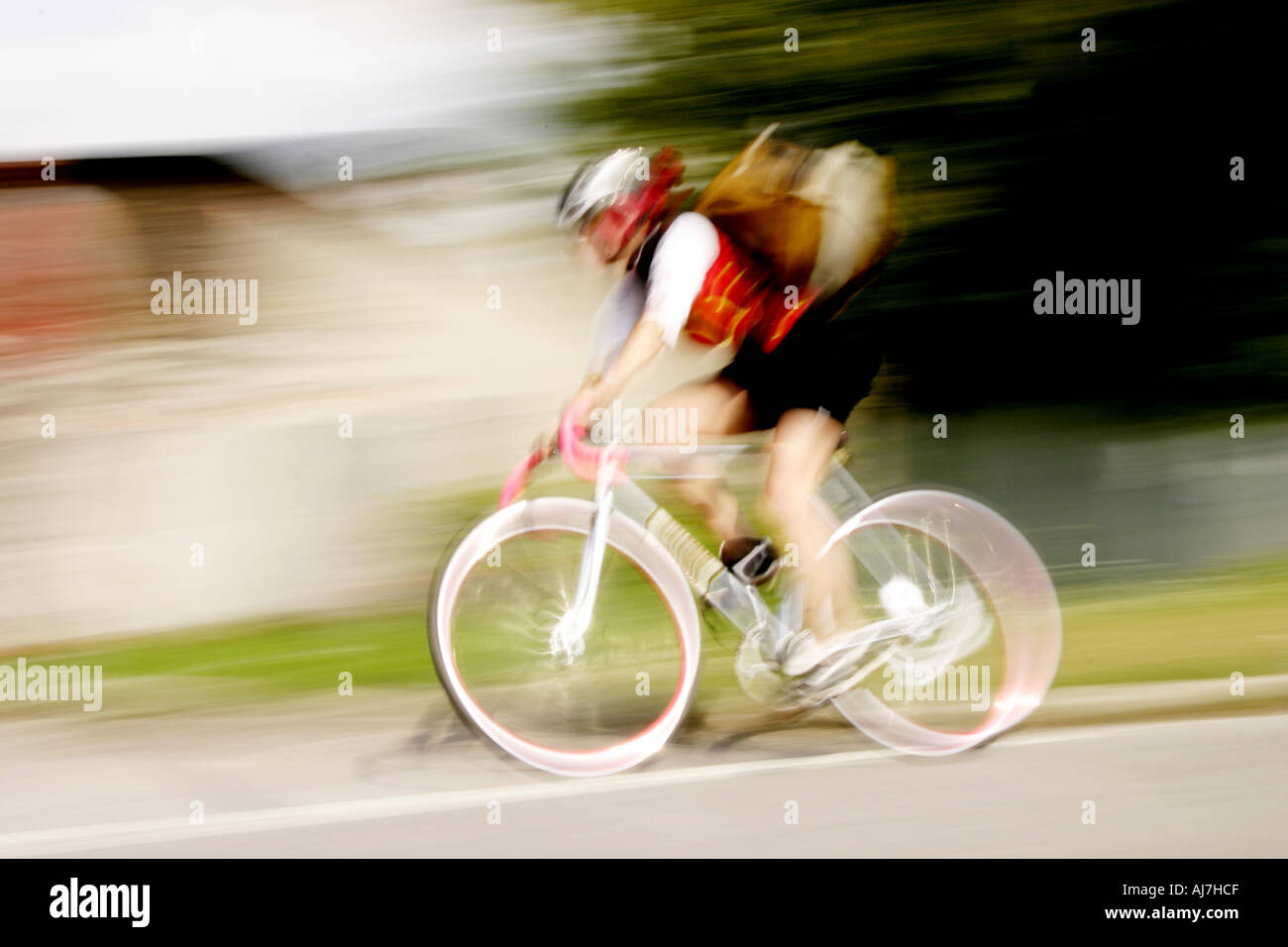 Male cyklist riding a bike Stock Photo - Alamy