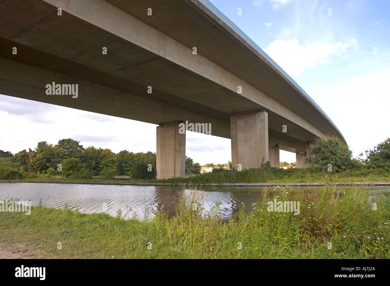 The M5 motorway crosses over the Exeter Canal, Exeter, Devon, UK Stock ...