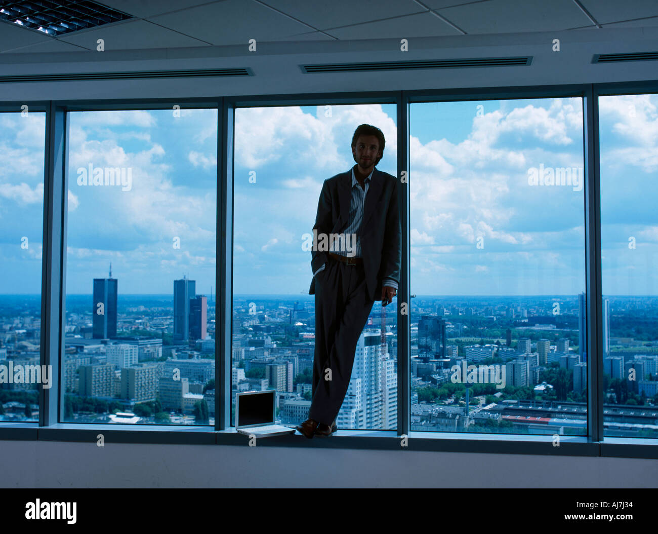 indoor office man 25 30 young suit business businessman window windows ...