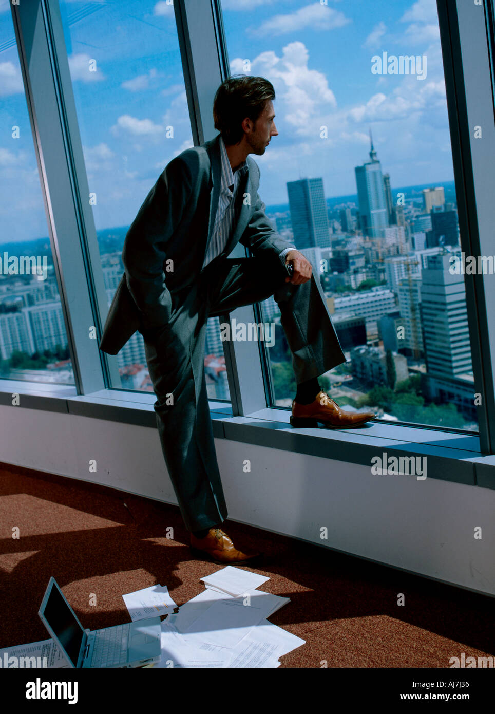 indoor office man 25 30 young dark haired profile suit business ...