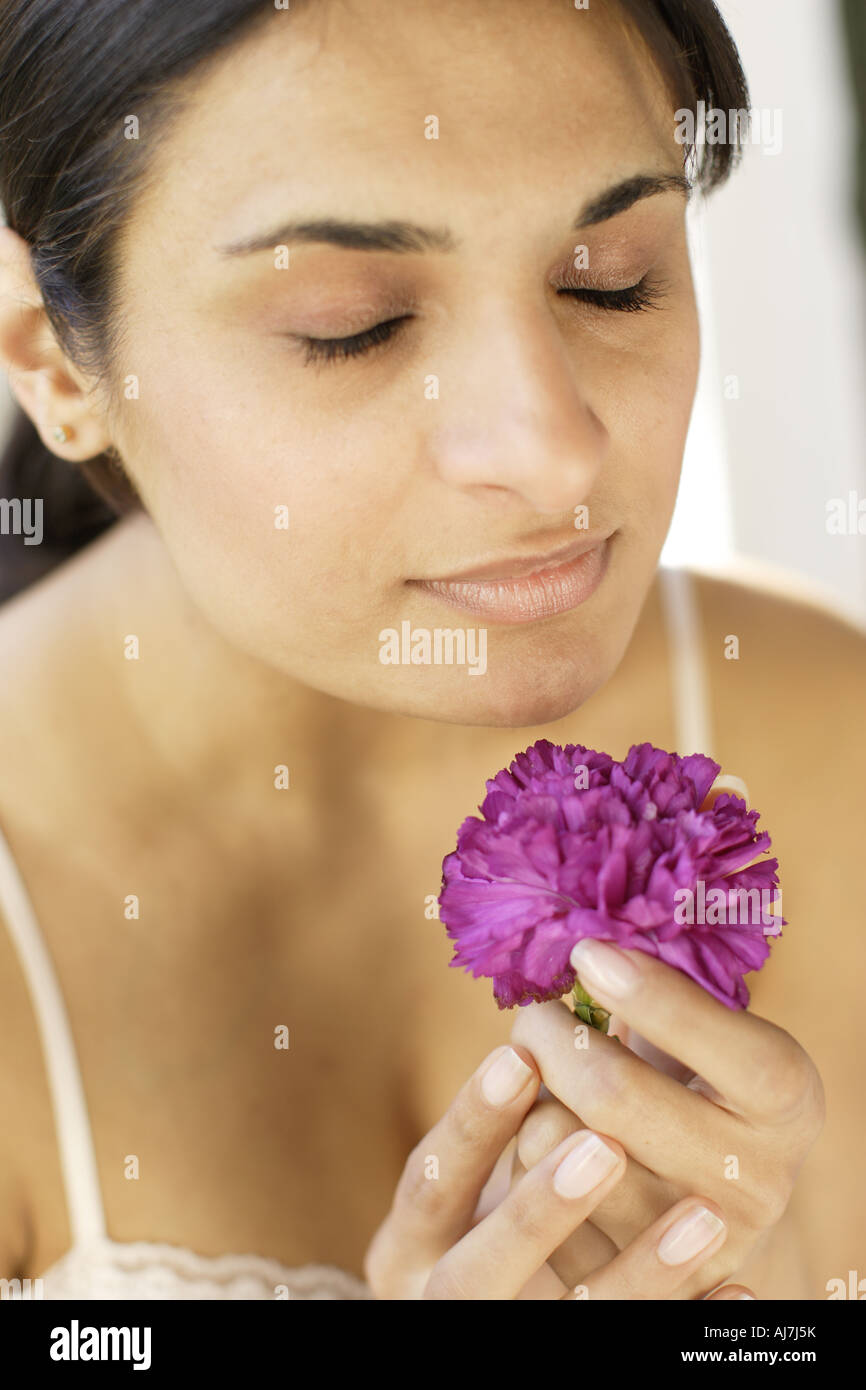 Asian woman sniff flower hi-res stock photography and images - Alamy