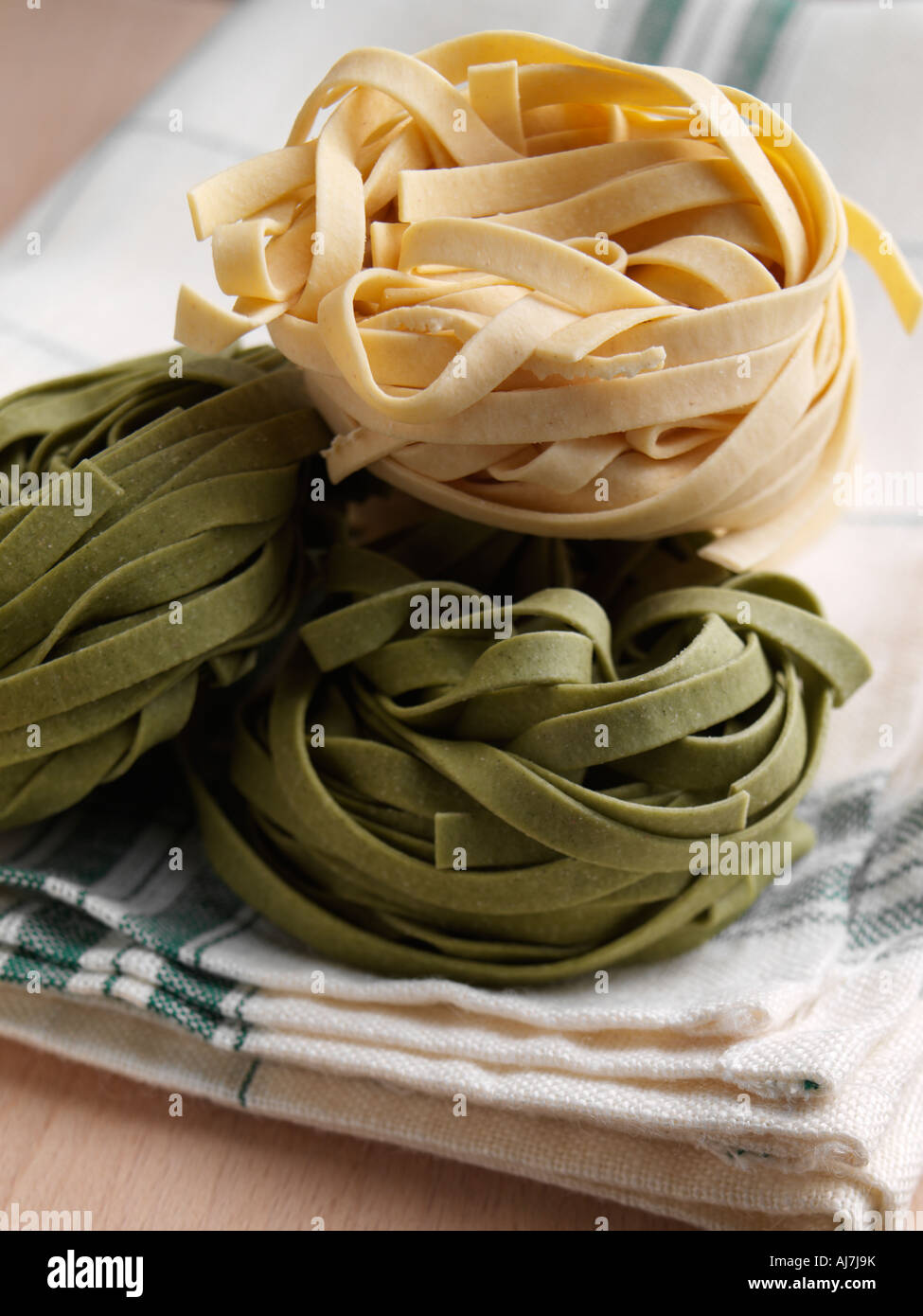 Italian dried spinach tagliatelle Stock Photo - Alamy