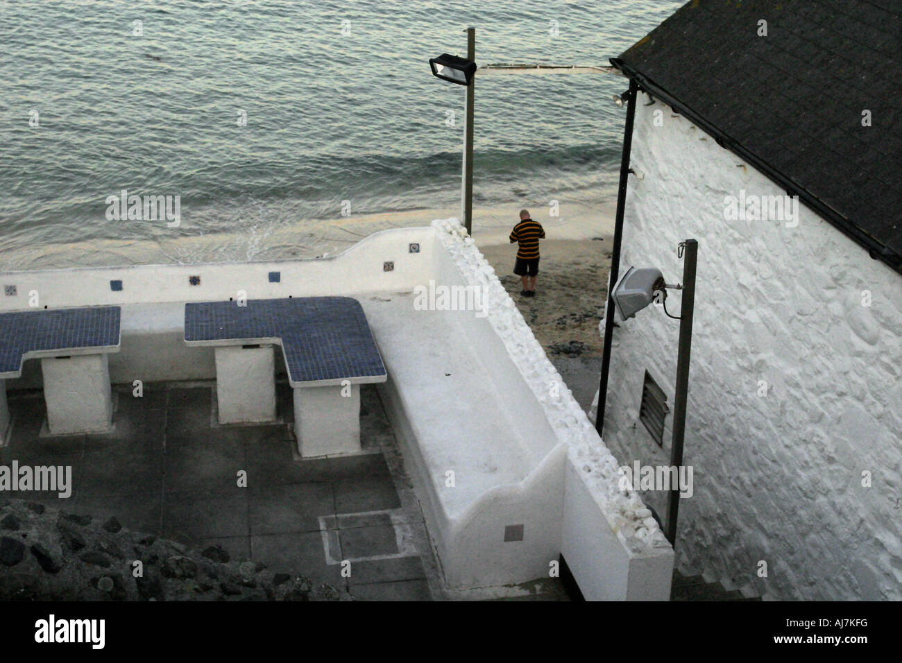 Man watching sea at St. Ives Cornwall UK Stock Photo - Alamy