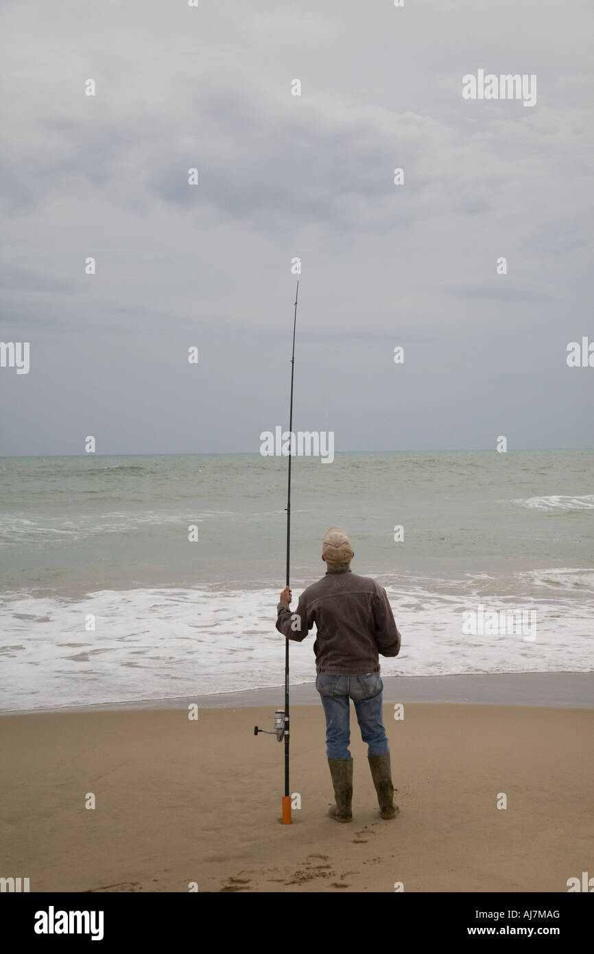 Angler on Beach, near Falconara Beach, Sicily Italy Stock Photo - Alamy