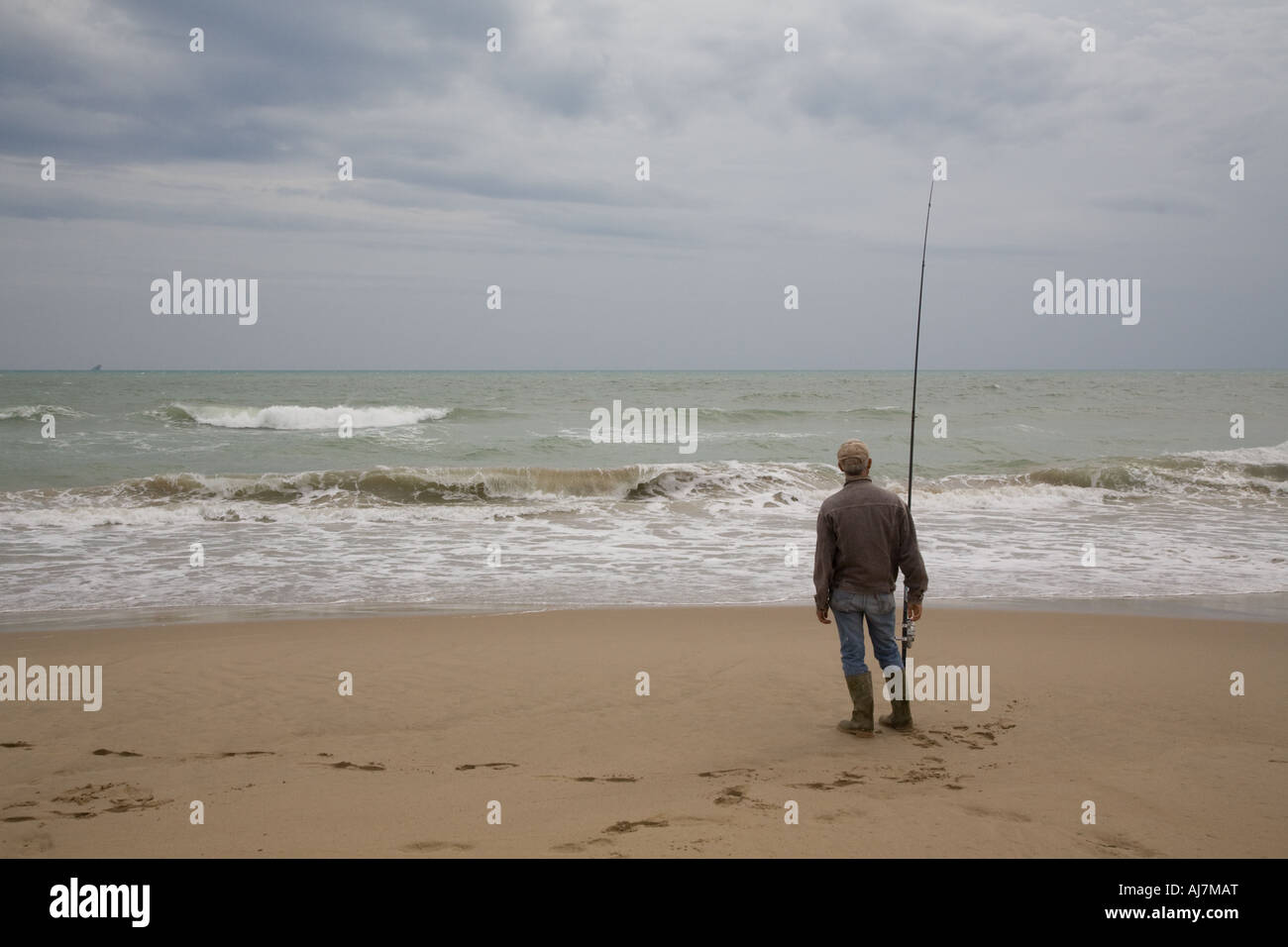 Angler on Beach, near Falconara Beach, Sicily Italy Stock Photo - Alamy