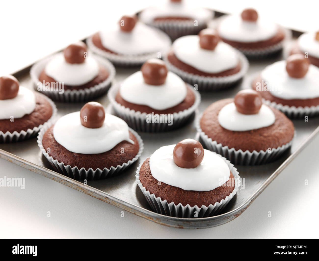 Cup cakes on a baking tray Stock Photo - Alamy