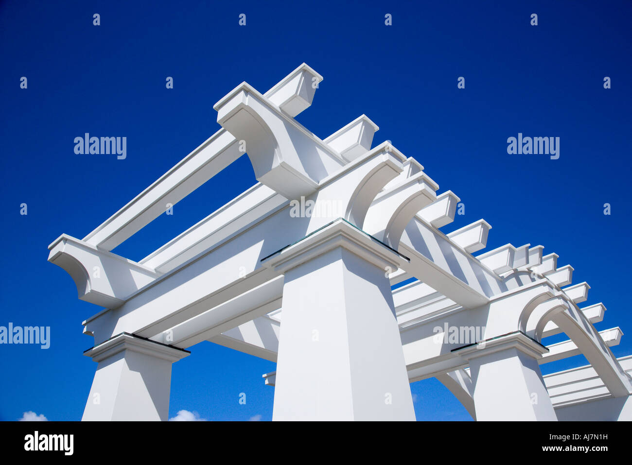 Detail of white arbor against blue sky Stock Photo - Alamy