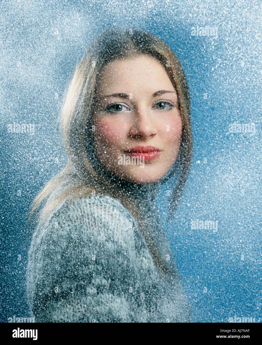 indoor studio winter flake flakes snow glass close up woman girl 20 25 young blonde smile Stock ...
