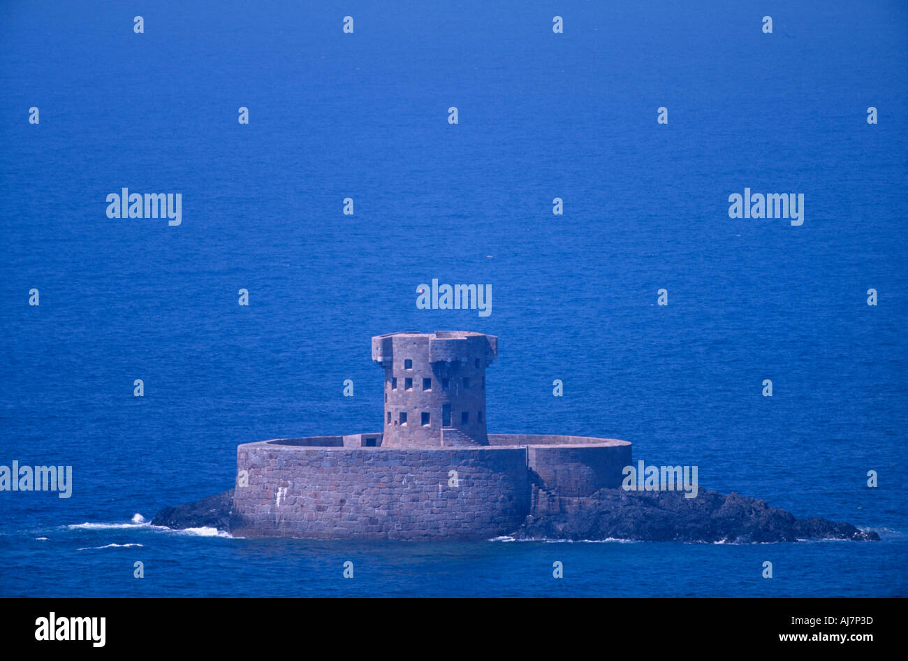 La Rocco tower standing in the calm English Channel at St Ouens bay La ...