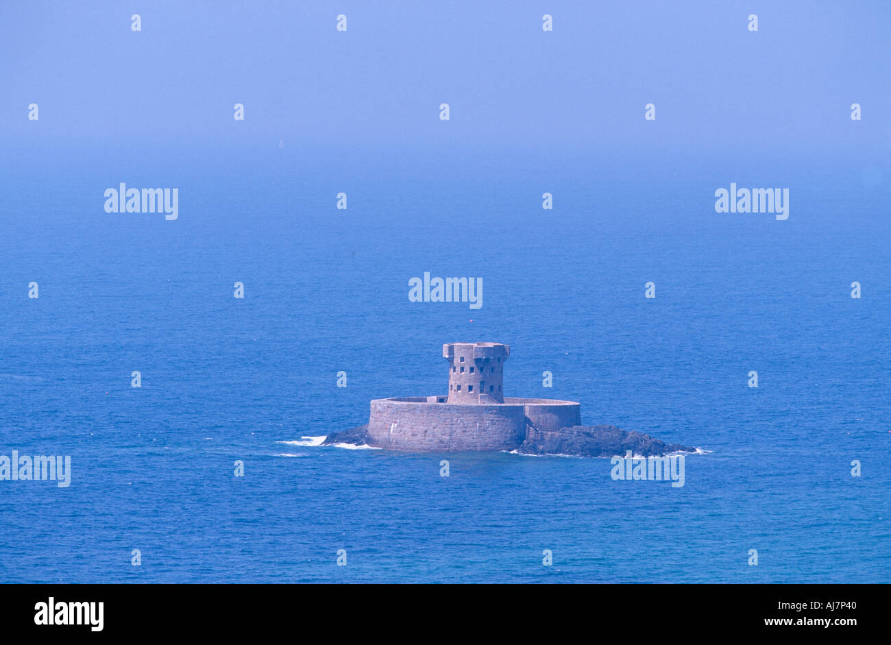 La Rocco tower standing in the calm English Channel at St Ouens bay La ...