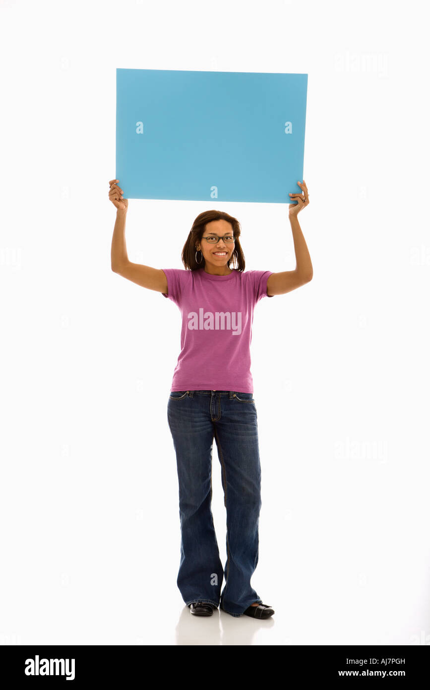 Woman standing over viewer Cut Out Stock Images & Pictures - Alamy