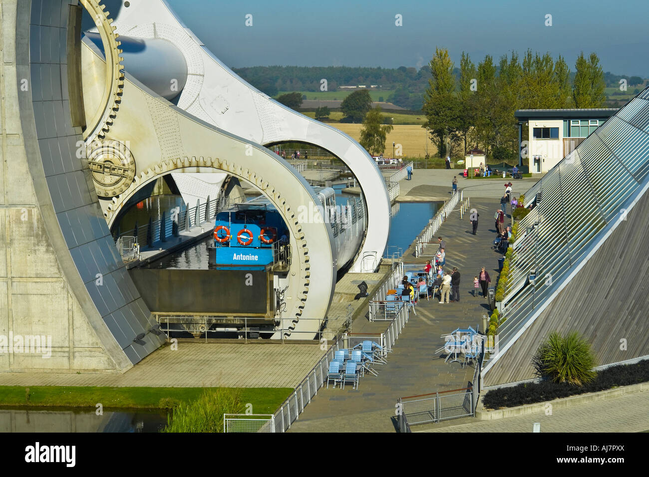 The Falkirk Wheel in Scotland connecting the Forth and Clyde Canal with ...