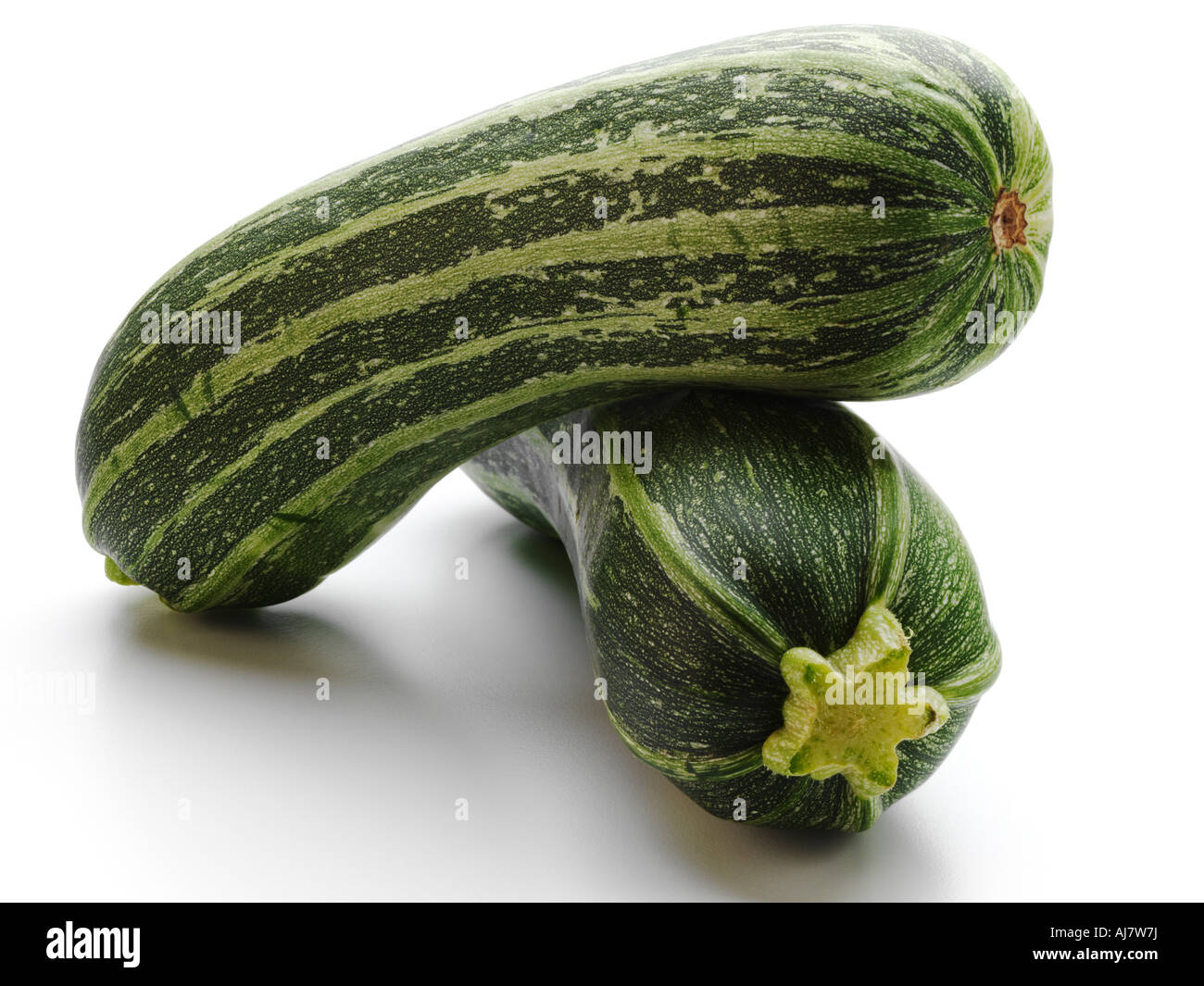 Two whole marrows on a white background Stock Photo - Alamy
