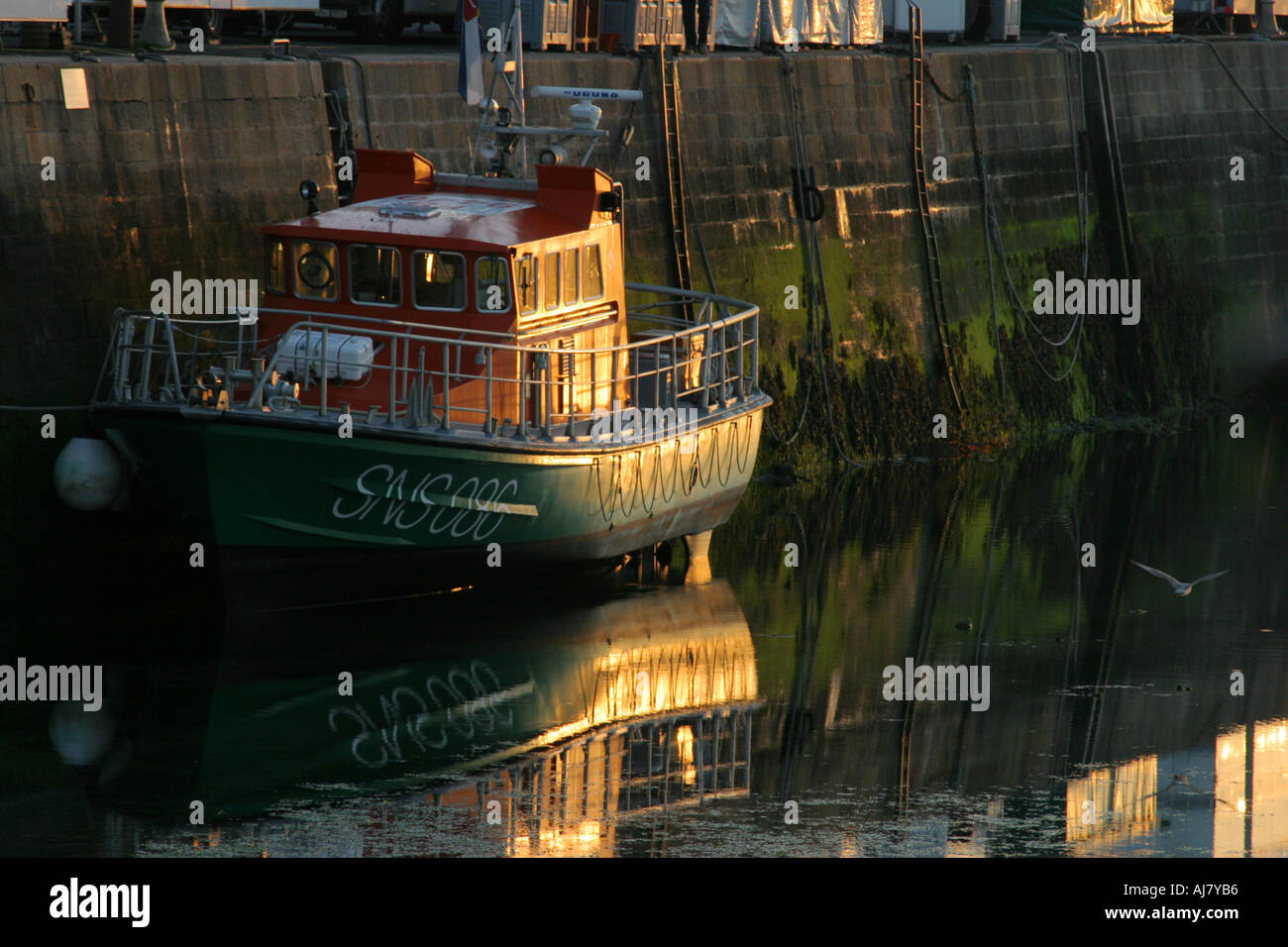 French Lifeboat tied up at Barfleur Harbour at Dawn Normandy France ...