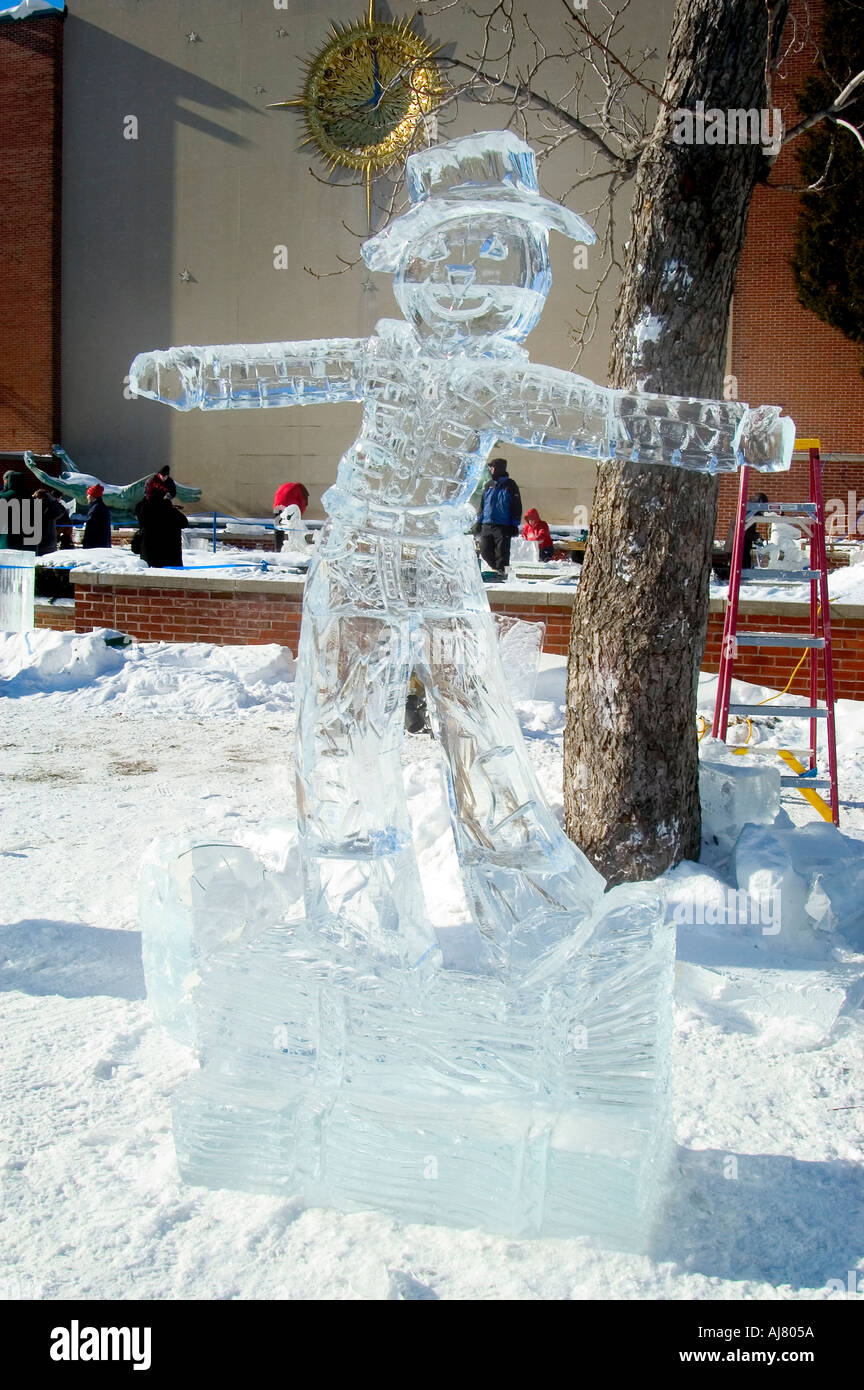 Artists Carve Ice Sculptures at Festival Contest Stock Photo - Alamy