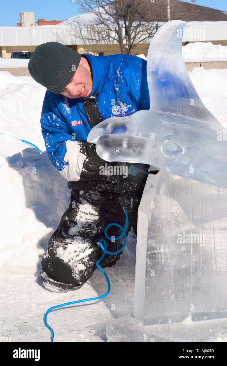 Artists Carve Ice Sculptures at Festival Contest Stock Photo - Alamy
