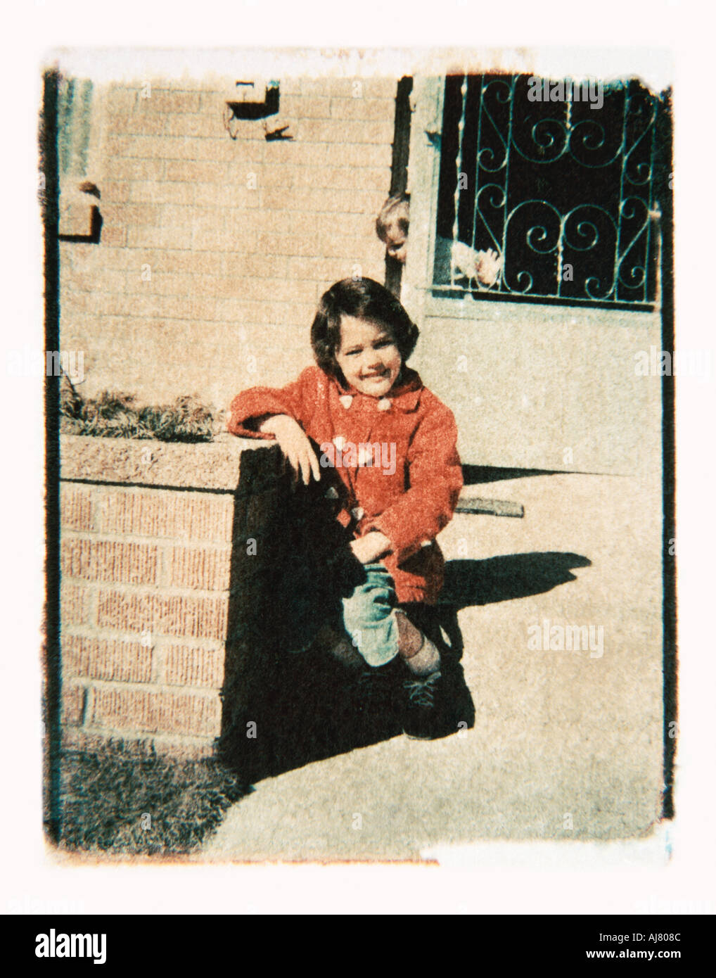 Child on front porch at home Stock Photo - Alamy