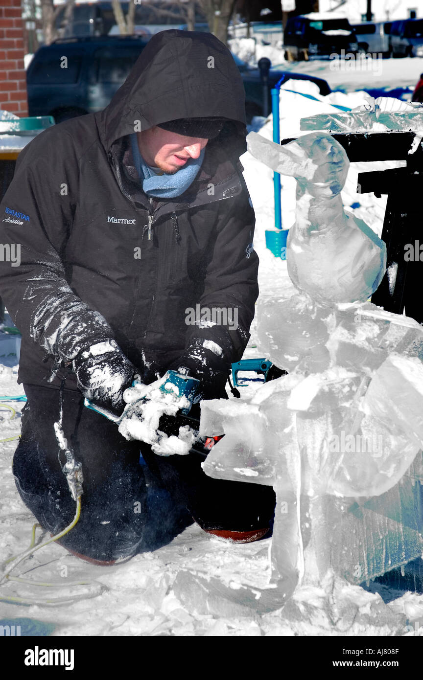 Artists Carve Ice Sculptures at Festival Contest Stock Photo - Alamy