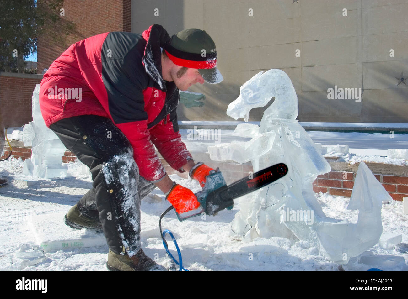 Artists Carve Ice Sculptures at Festival Contest Stock Photo - Alamy