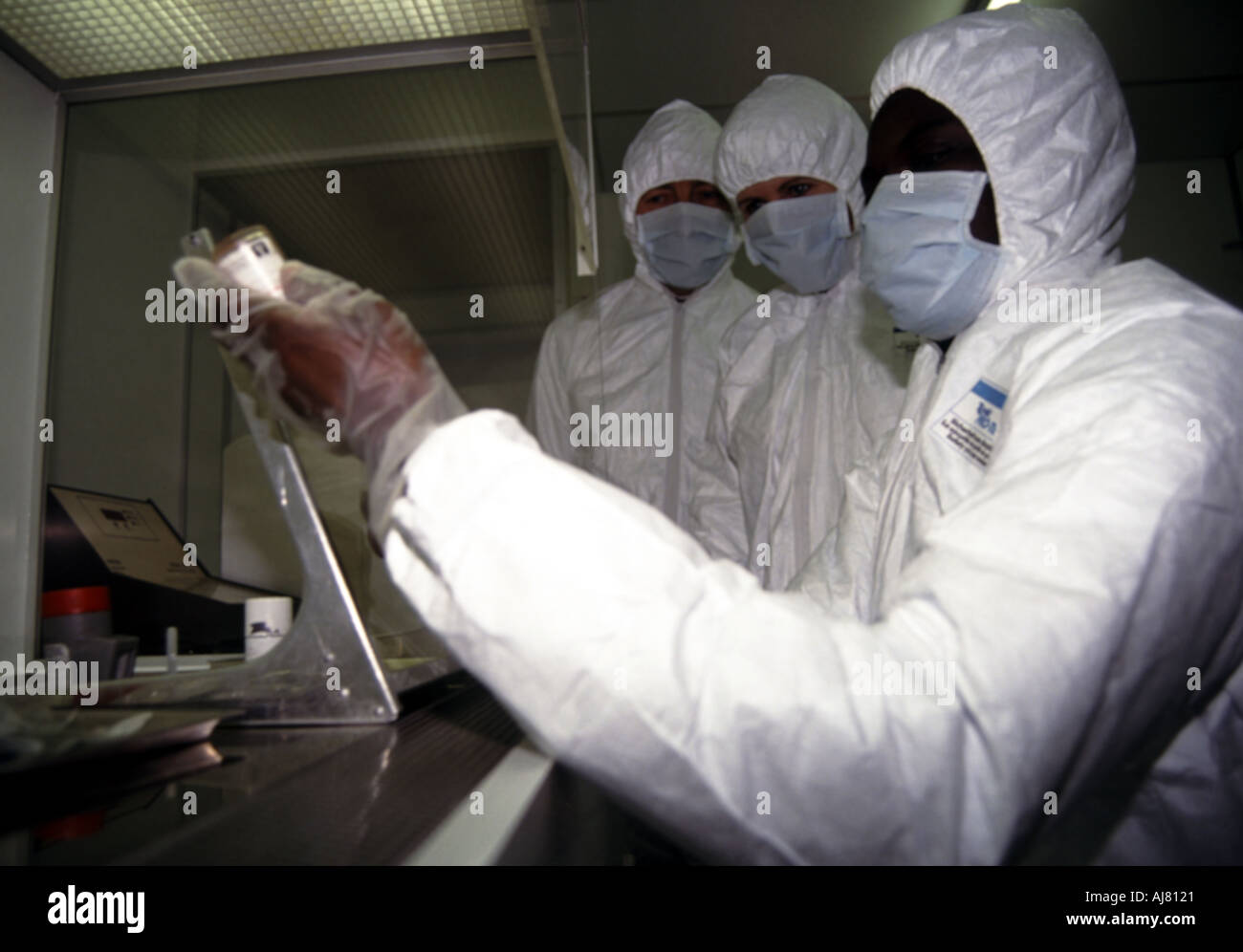 Nuclear research scientists in protective clothing, UK Stock Photo - Alamy