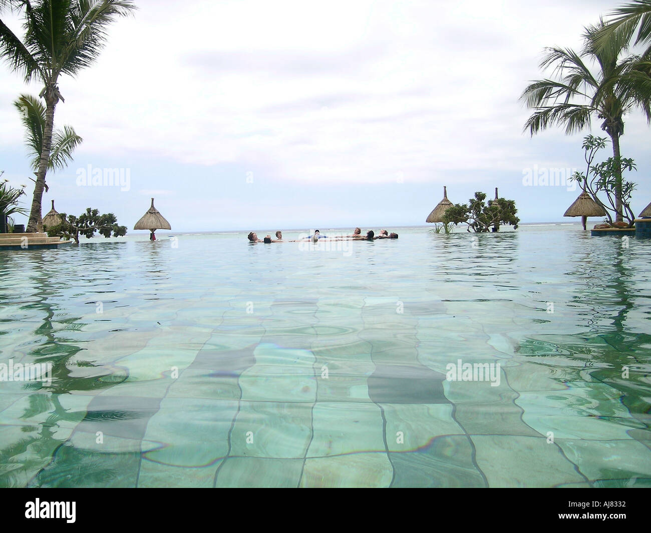 idyllic infinity pool in hotel with sea in background, Mauritius Stock ...