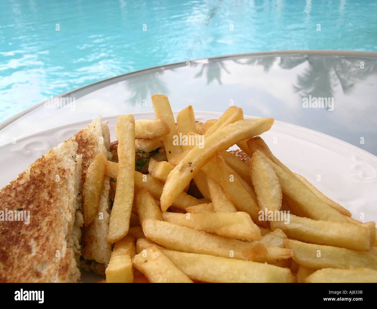 French fries / chips / toast / carbohydrates served by hotel pool Stock ...
