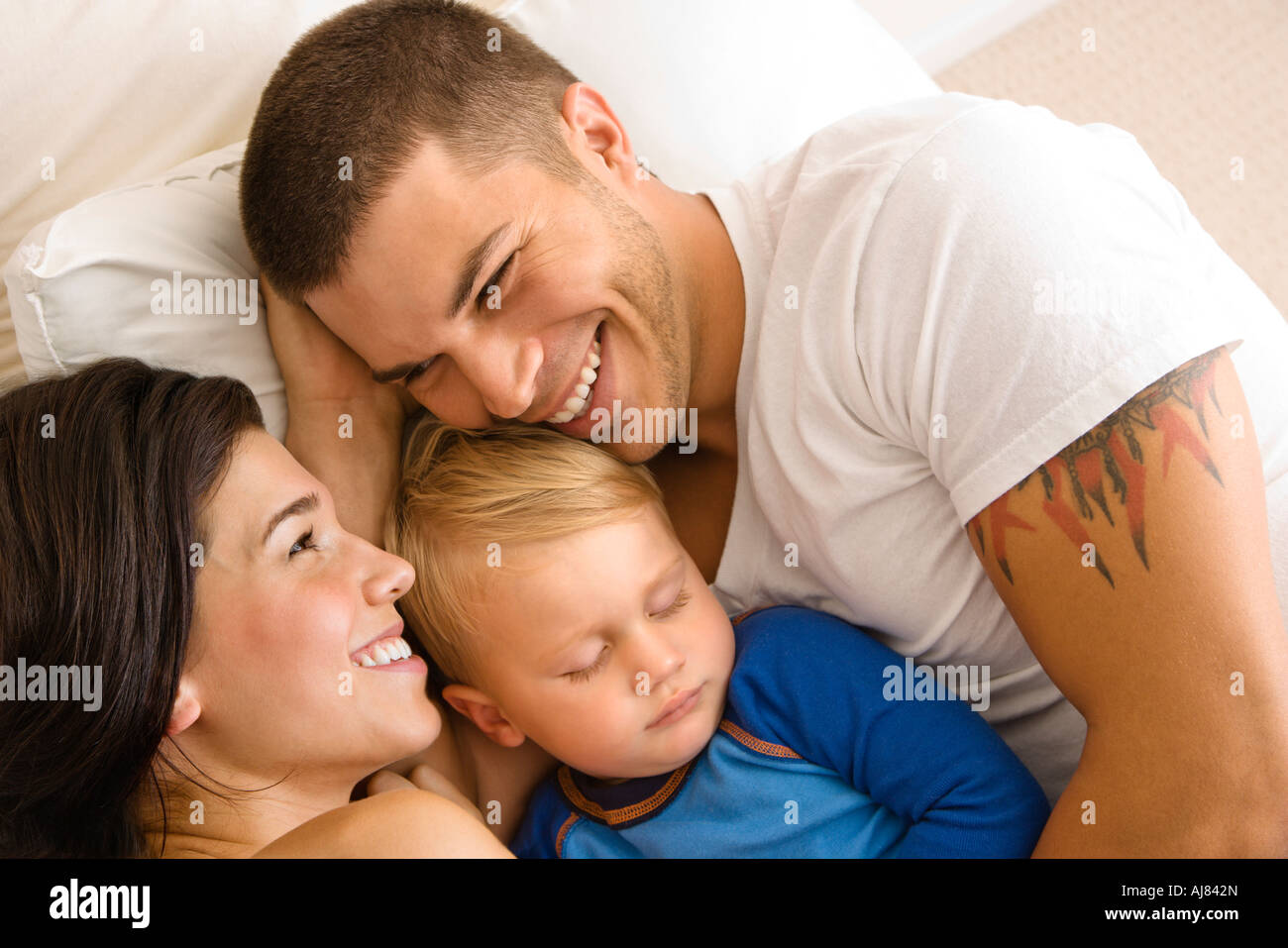 Father son father cuddling sleeping hi-res stock photography and images ...